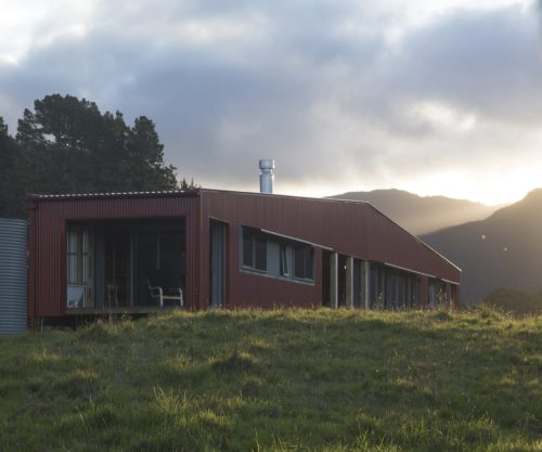 New Zealand tramping huts inspired the design of this getaway near Tairua