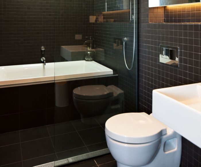 This family bathroom blends functionality with minimalist design