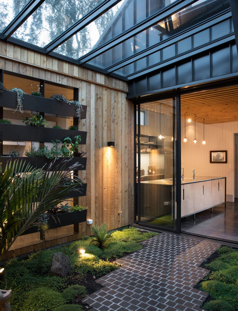 This home's robust exterior is the perfect protection from a busy main road