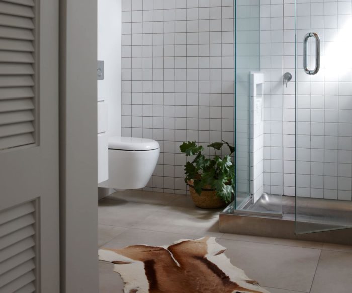 A large bathroom is split in two to make an ensuite