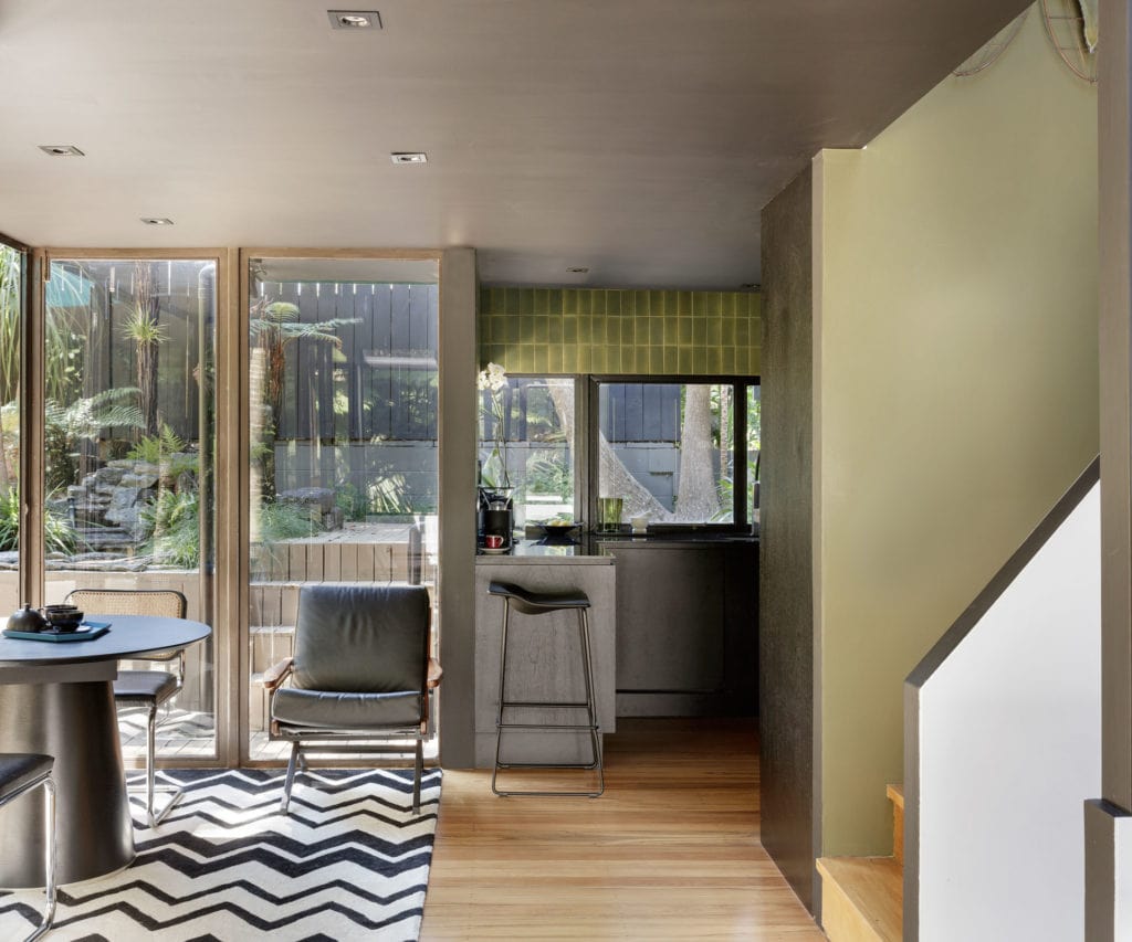 An incredible treetop home by Architect Claude Megson is gently restored