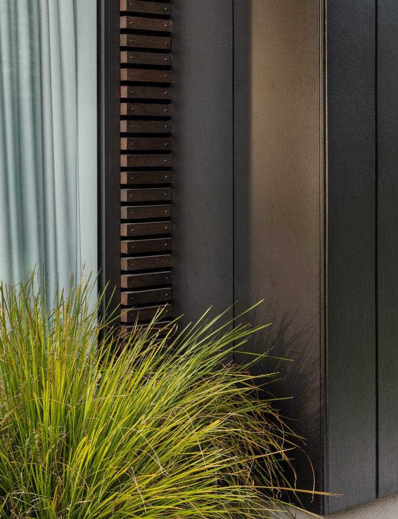 This black-clad Wanaka home brings contemporary style to a rustic setting