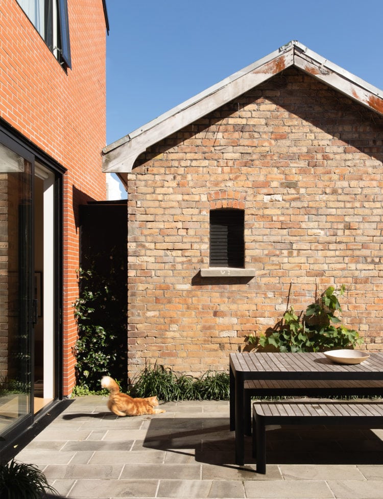 This stylish home will make you want brick walls and a gabled roof