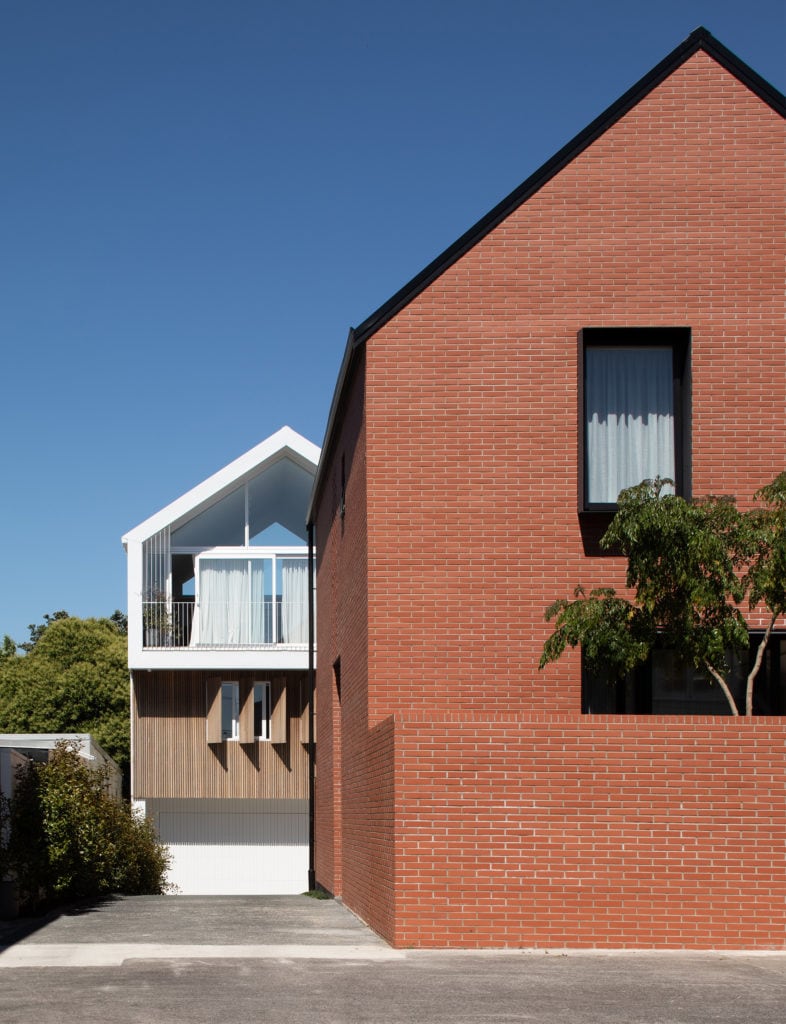 This stylish home will make you want brick walls and a gabled roof