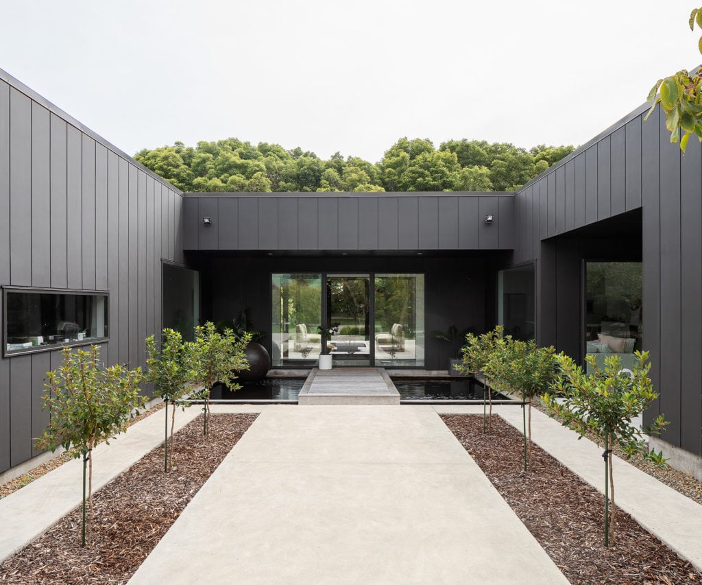 This Waikanae home makes a statement with its oversized black cladding