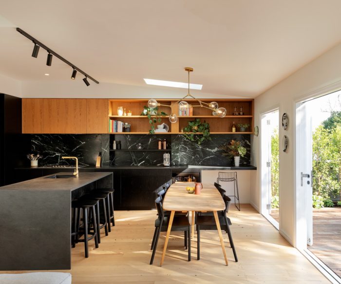 This kitchen's emerald green marble splashback adds a dramatic touch